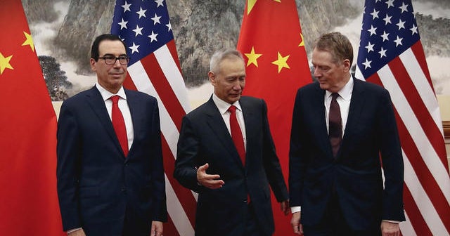 Trump threatens more tariffs on China ahead of crucial meetings - CBS News