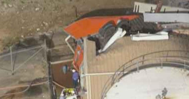 Driver killed after semi falls off bridge in Houston - CBS News