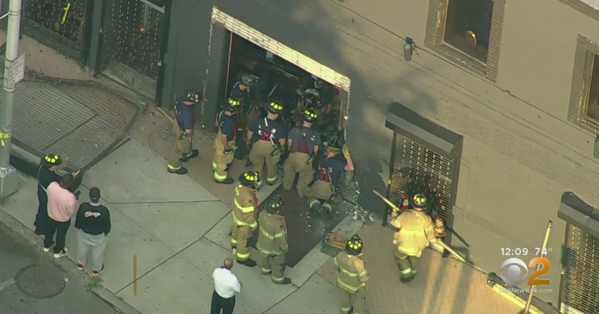 Car Hits Building In Jersey City - CBS New York