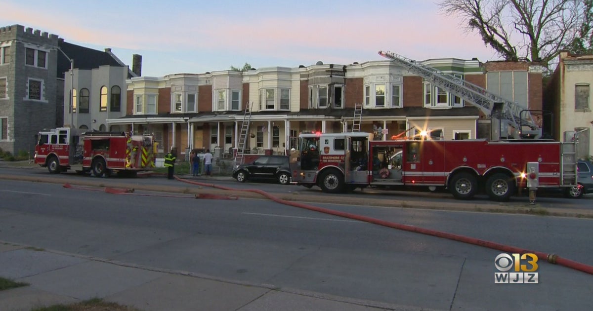 Woman Hospitalized After Baltimore Row Home Fire - CBS Baltimore