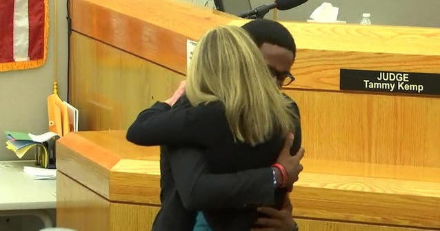 Botham Jean's brother forgives and hugs ex-cop as she's sentenced to ...
