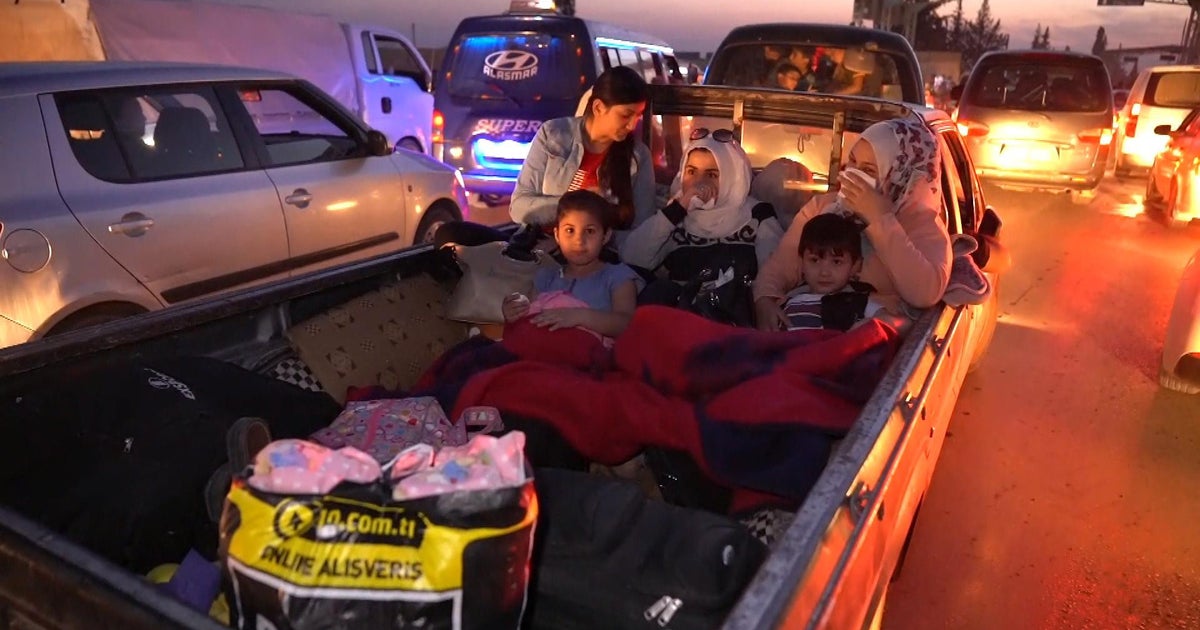 Turkey invades Syria: Civilians rush to escape Turkish airstrikes in ...