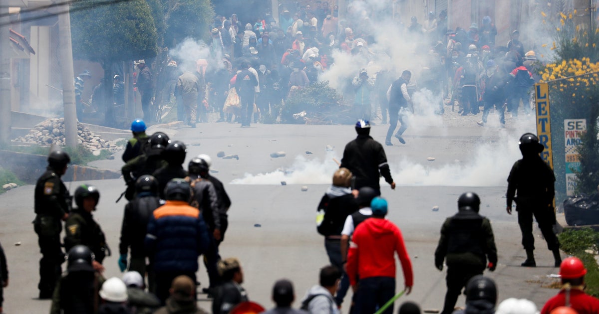 Bolivia's Evo Morales flees "coup" for exile in Mexico and leaves chaos ...