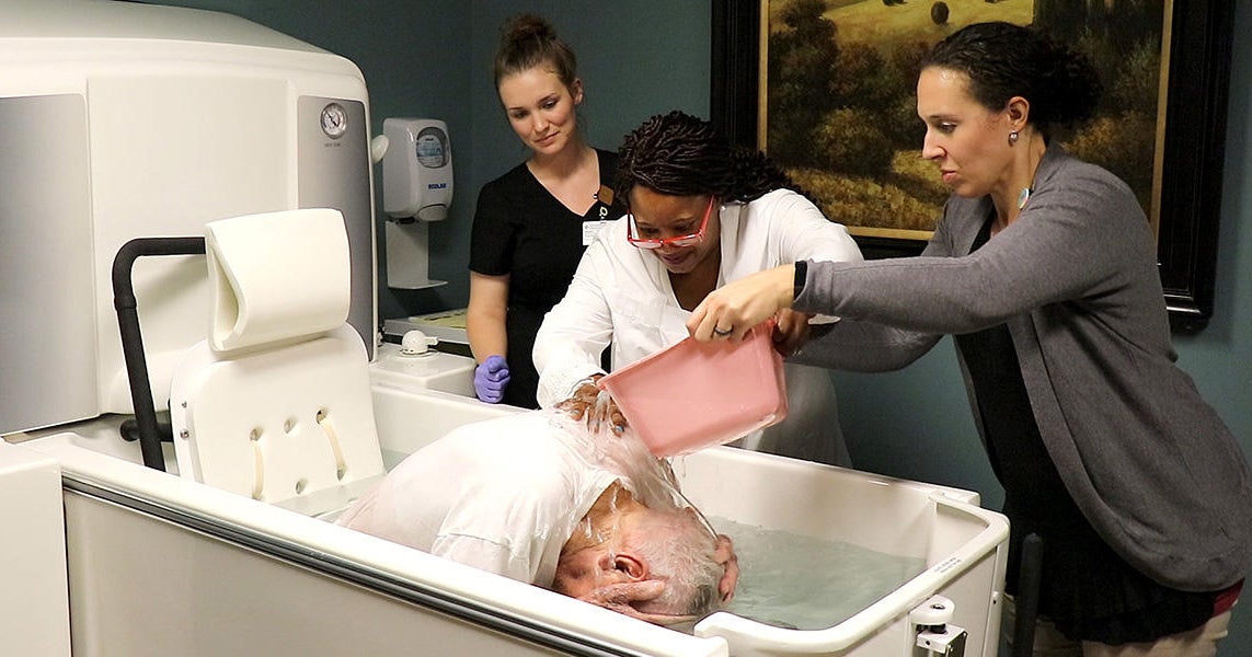 Hospice baptism: Man in hospice care granted final dying wish of being ...