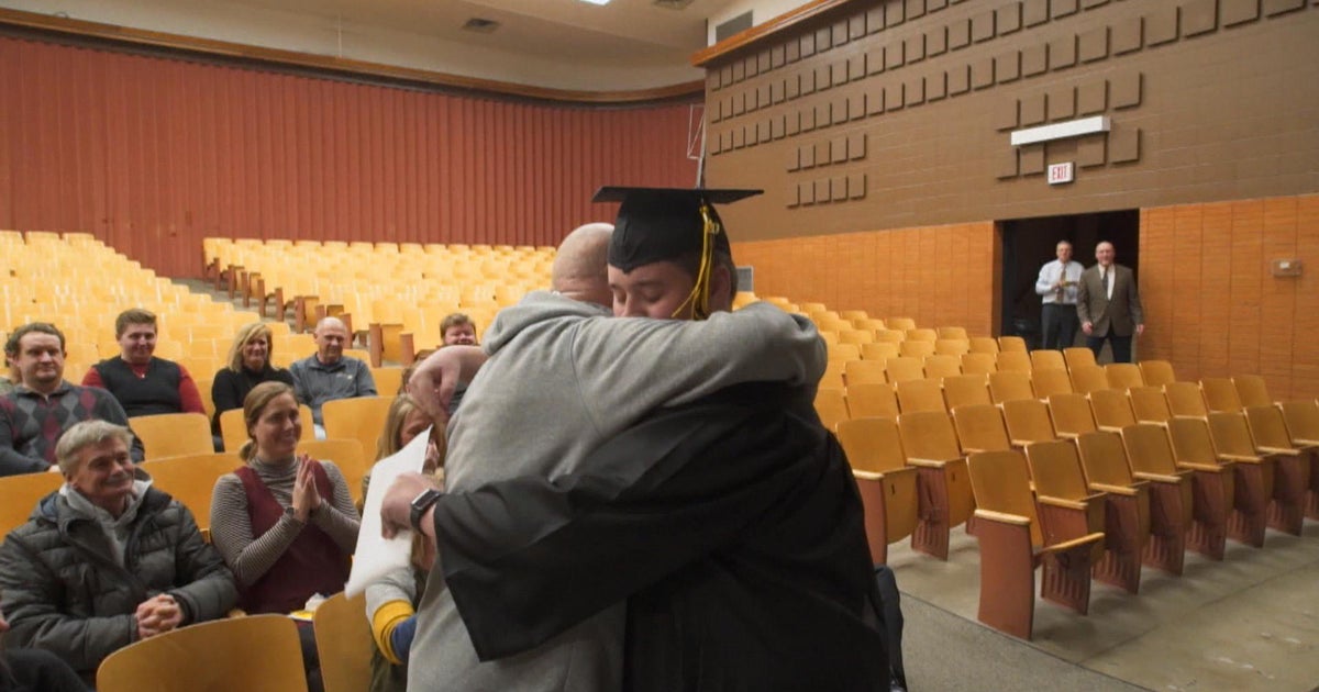 Dying man surprised by special graduation for his son - CBS News
