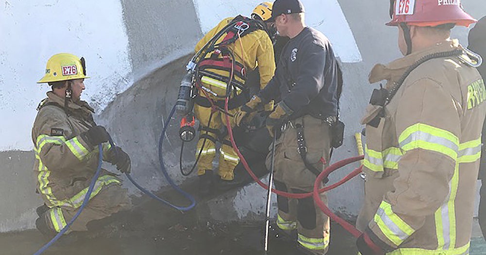 Firefighters Rescue Man Wedged In Temecula Storm Drain - CBS Los Angeles