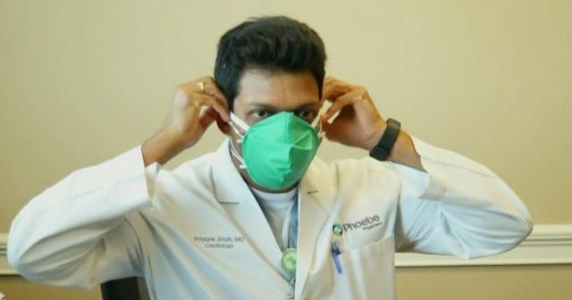 Hospital sews makeshift masks to combat shortage - CBS News