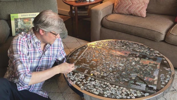 Piecing together the history of jigsaw puzzles - CBS News