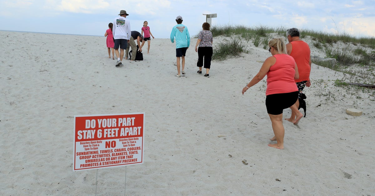 Southern states largely go it alone in reopening decisions - CBS News