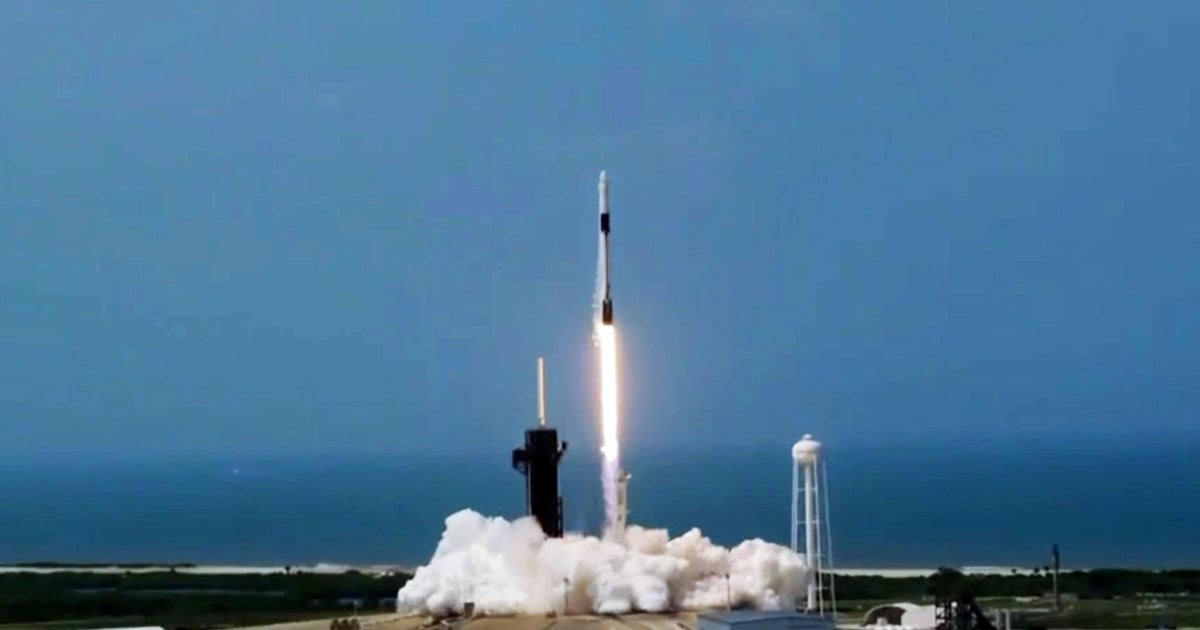 SpaceX launches two NASA astronauts on historic mission - CBS News