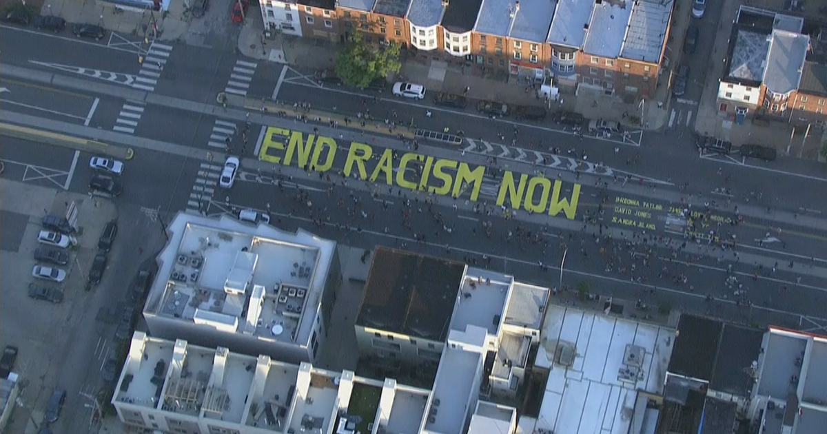 'End Racism Now': Volunteers Rally Together To Temporarily Paint ...