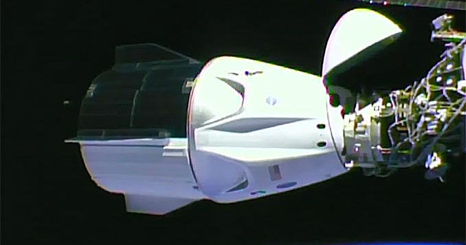 Astronauts gear up for Friday spacewalk amid planning for Crew Dragon ...