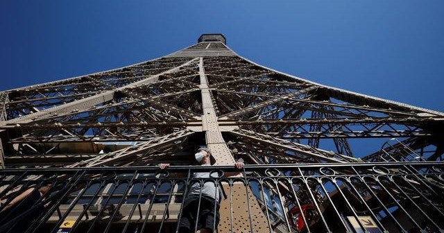 Eiffel Tower reopens to tourists after 3-month shutdown - CBS News Eiffel Tower reopens to tourists after 3-month shutdown - CBS News