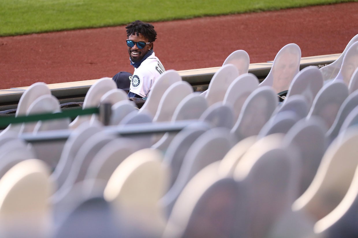 MLB commissioner confident league will get through season as more ...