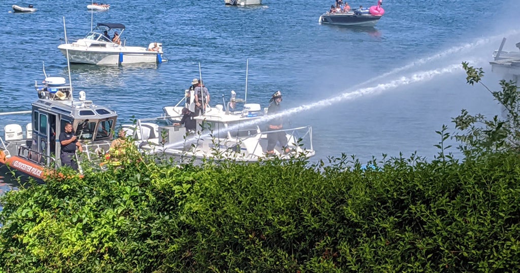 Firefighters Fight Flames In Gloucester Home From The River - CBS Boston
