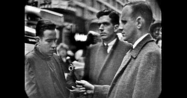 Shocked reaction from people on the street - CBS News