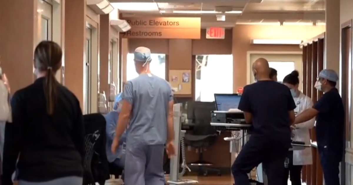 A look inside the COVID-19 ward at Wisconsin's largest hospital - CBS News
