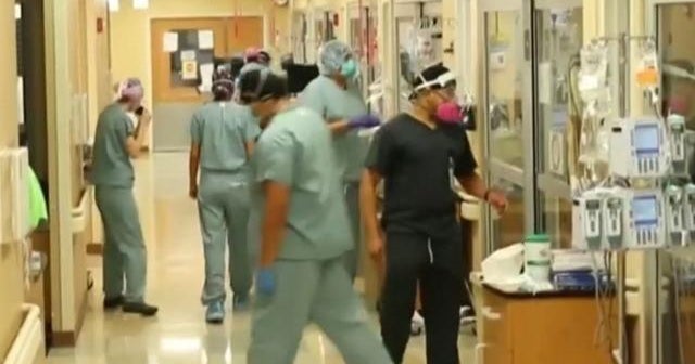 Covid 19 Cases In U S Surge To Another Record High Cbs News