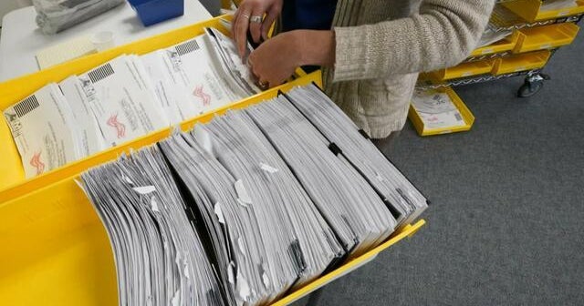 Judge orders USPS to sweep facilities for mail-in ballots - CBS News