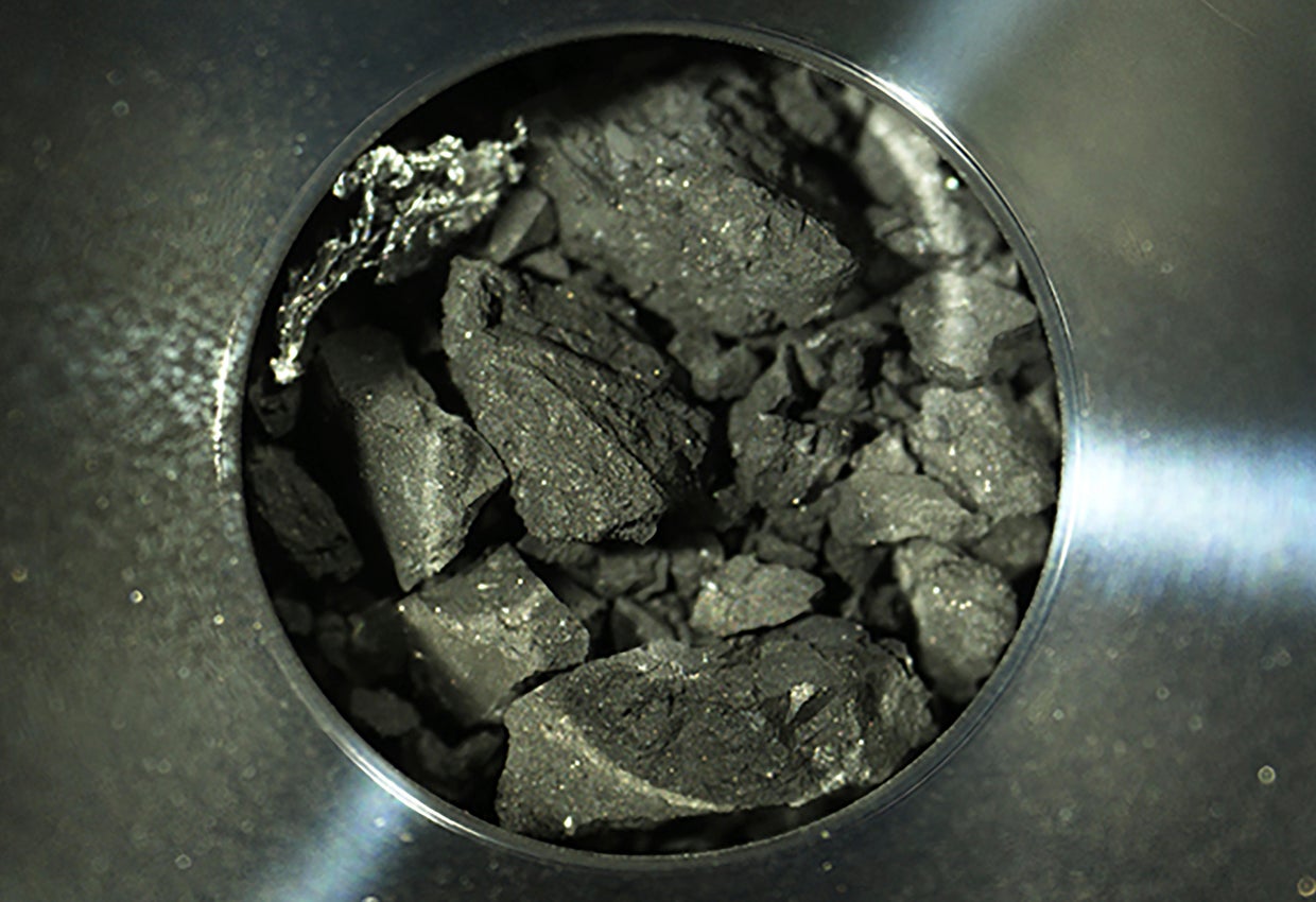 Asteroid chips that look like charcoal sent back to Earth by Japanese ...