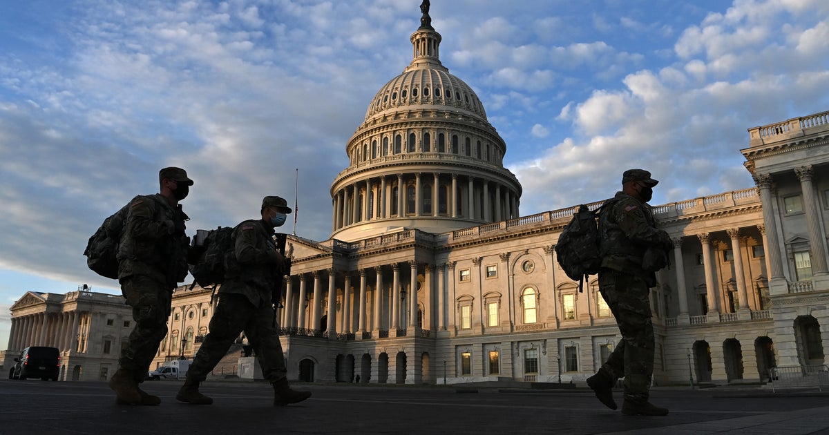 Americans see democracy under threat — CBS News poll - CBS News