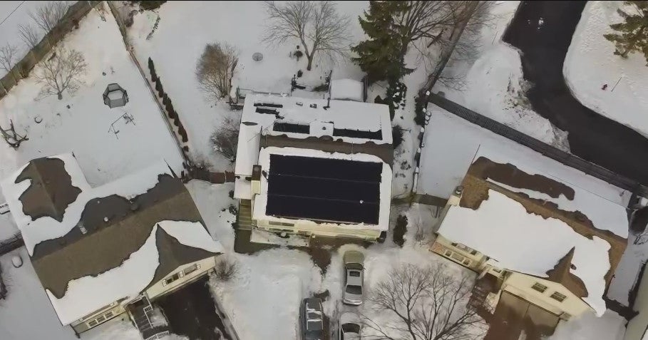Melting Snow Slides Off Rooftop Solar Panels And Damages Cars In ...