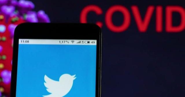Twitter to begin labeling posts with COVID vaccine misinformation - CBS ...