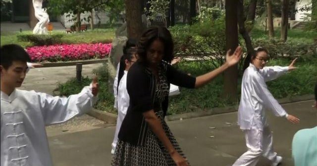 First lady tries tai chi at Chinese high school - CBS News