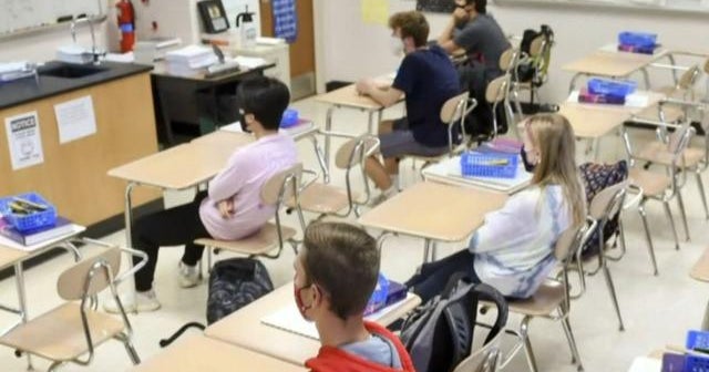 Doctor on CDC reducing social distancing guidelines in schools, Biden ...