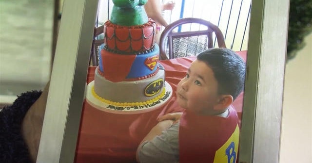 Indiana boy gets superhero funeral - CBS News