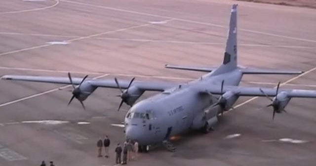 Stowaway child's body found in American military plane raises security ...