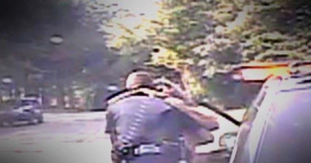 Michigan officer saves choking woman during traffic stop - CBS News