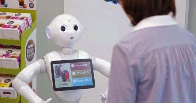 Watch: New humanoid robot helps Nestle sell coffee machines - CBS News