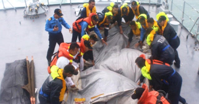 Most bodies still unaccounted for from AirAsia Flight 8510 - CBS News