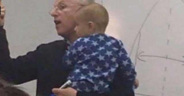 Photo of professor holding baby during class goes viral - CBS News