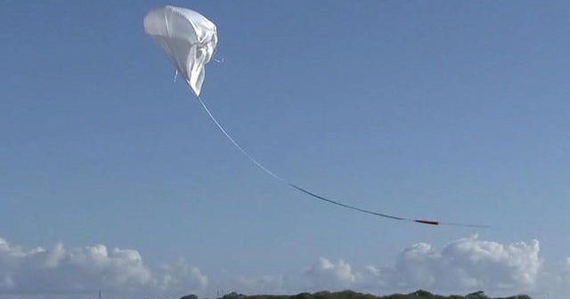 NASA test launches "flying saucer" for Mars mission - CBS News