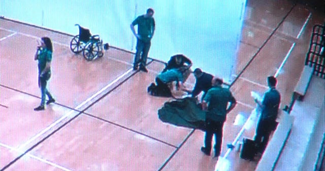 School staff saves student who collapsed at gym - CBS News
