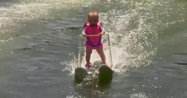 Watch: 6-month-old breaks record for youngest water skier - CBS News
