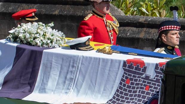 Prince Philip is laid to rest at Windsor - CBS News