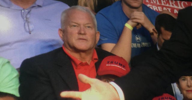 Ex-congressman Mark Foley sits behind Trump at rally - CBS News