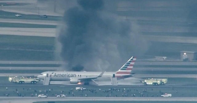 Passenger on plane that caught fire talks about his escape - CBS News