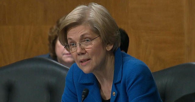 Dr. Carson and Sen. Warren clash at confirmation hearing - CBS News