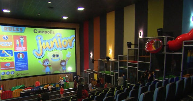 Movie theater offers playground for kids - CBS News