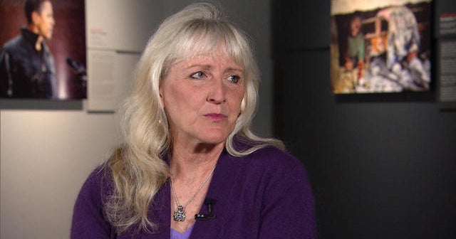 Pulitzer-winning photographer Carol Guzy shows hope in darkness - CBS News