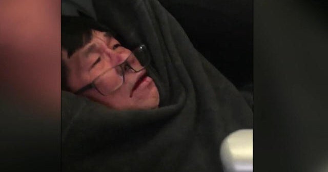 United Airlines Settles With Passenger Dragged Off Of Plane Cbs News