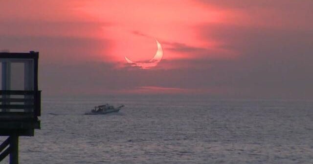 "Ring of Fire" dazzles onlookers as moon blocks sun in near-total ...