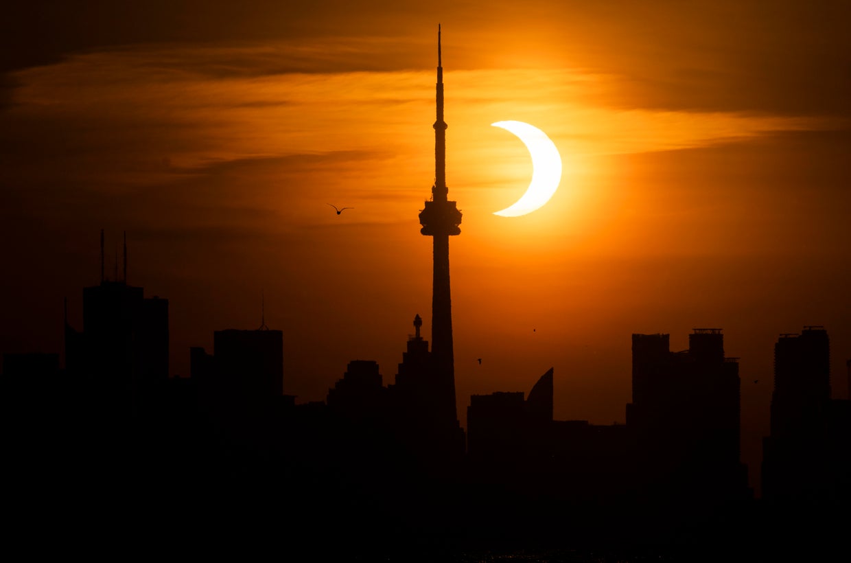 Rare "ring of fire" solar eclipse captured in spectacular photos from ...