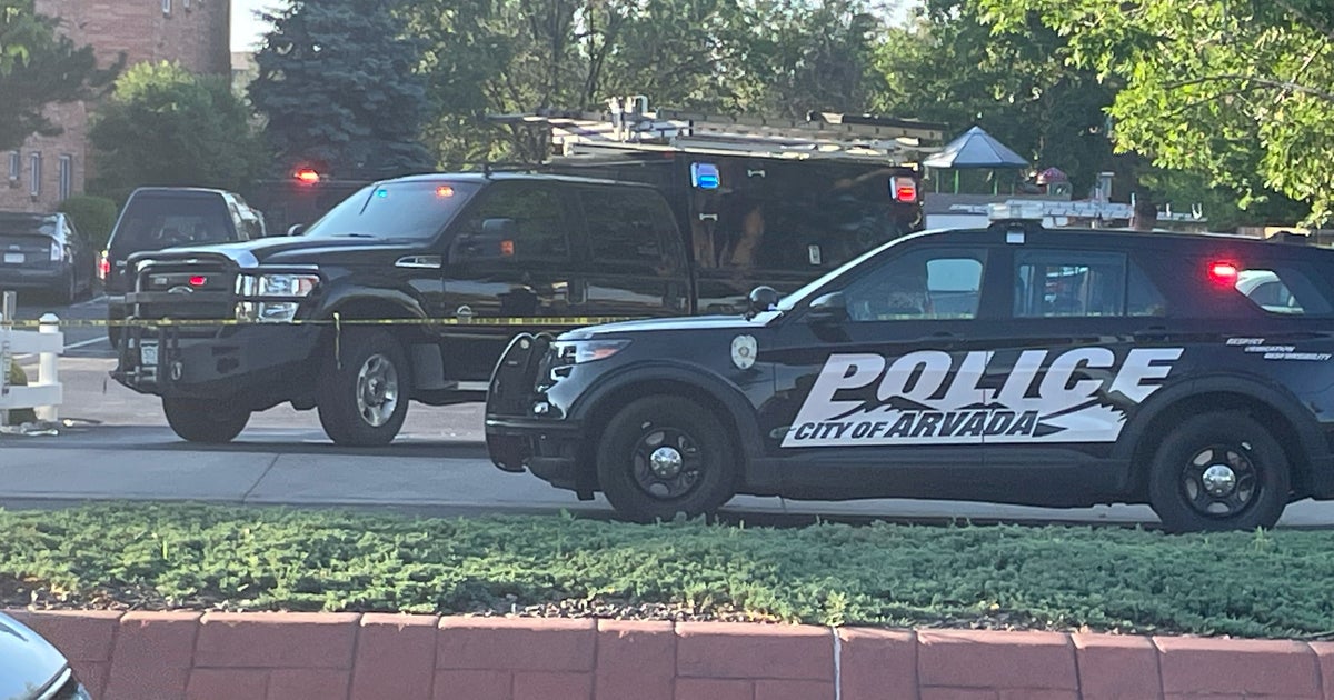 Large Police Presence Seen Outside Apartment Just Blocks From Deadly ...