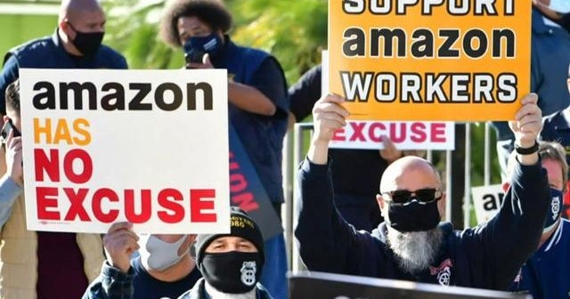 Teamsters plan effort to unionize Amazon - CBS News