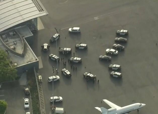 Police chase LAX intruder's car across two busy runways after major ...